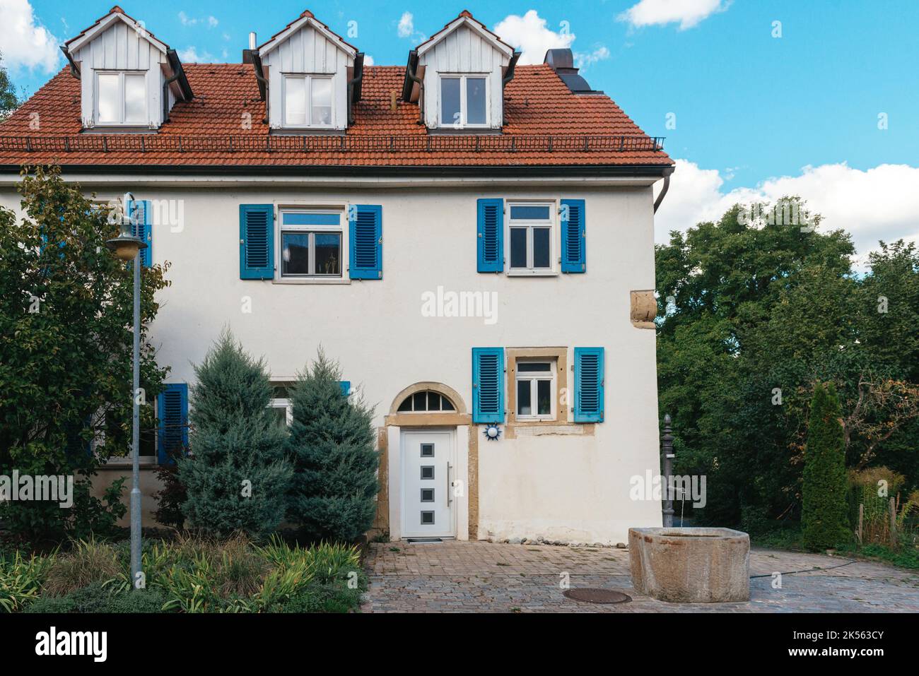 Traditional small house with beautiful outdoor decor facade in Germany ...