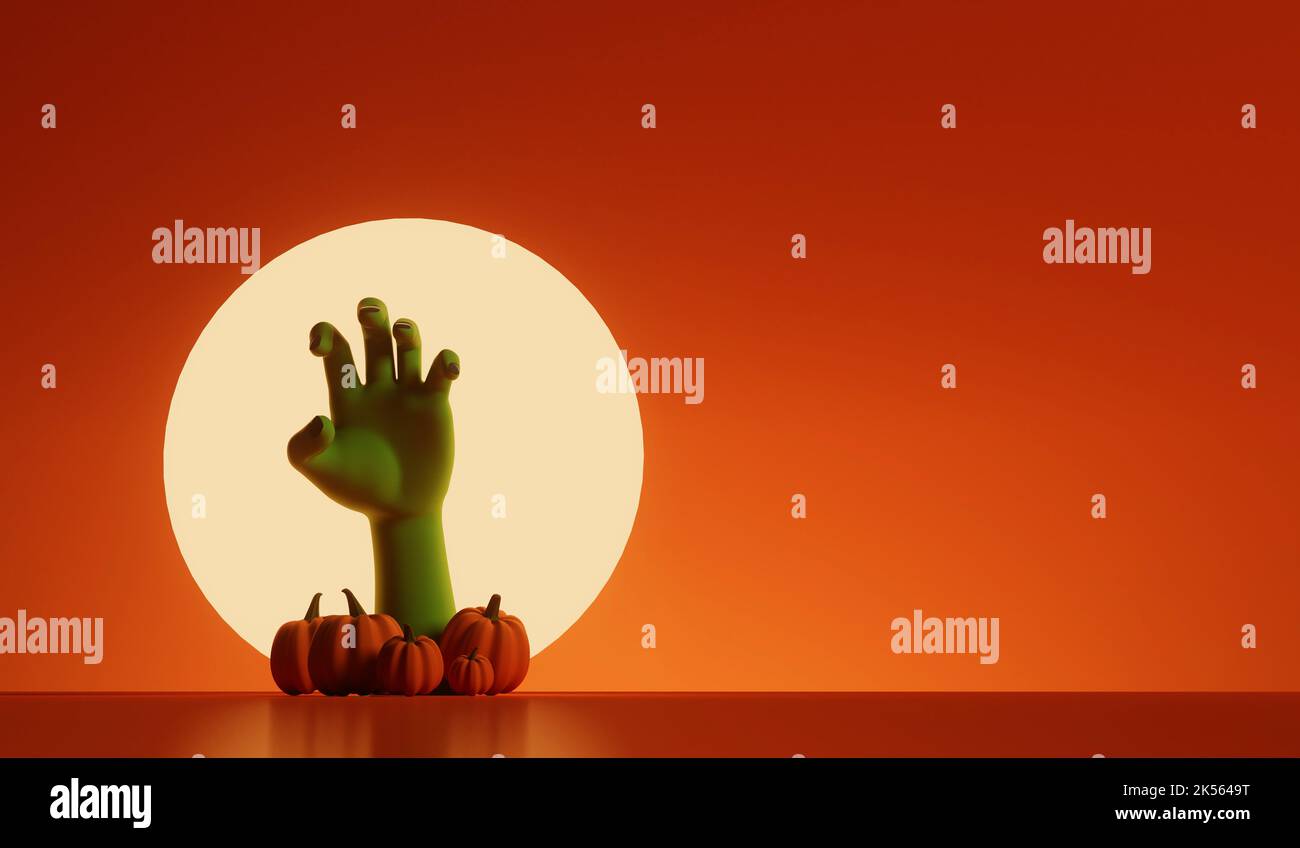 Silhouette of an undead zombie hand reaching out with a bright moon ...