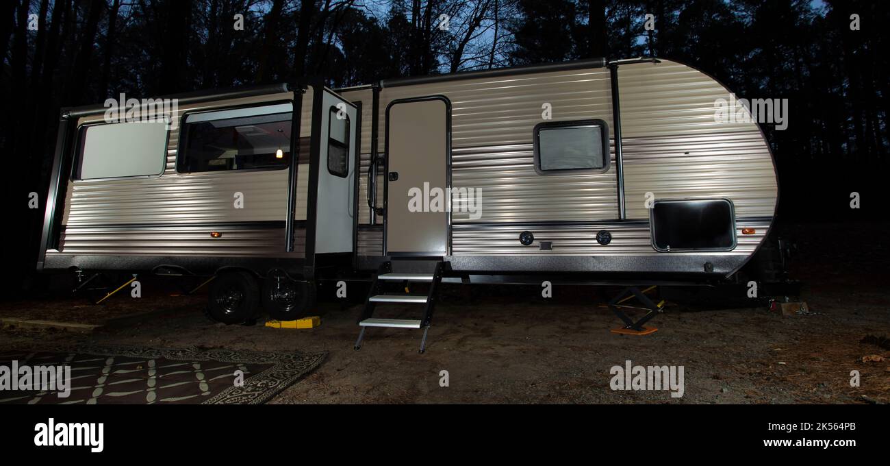 RV at night in a forest near Jordan Lake in North Carolina Stock Photo ...
