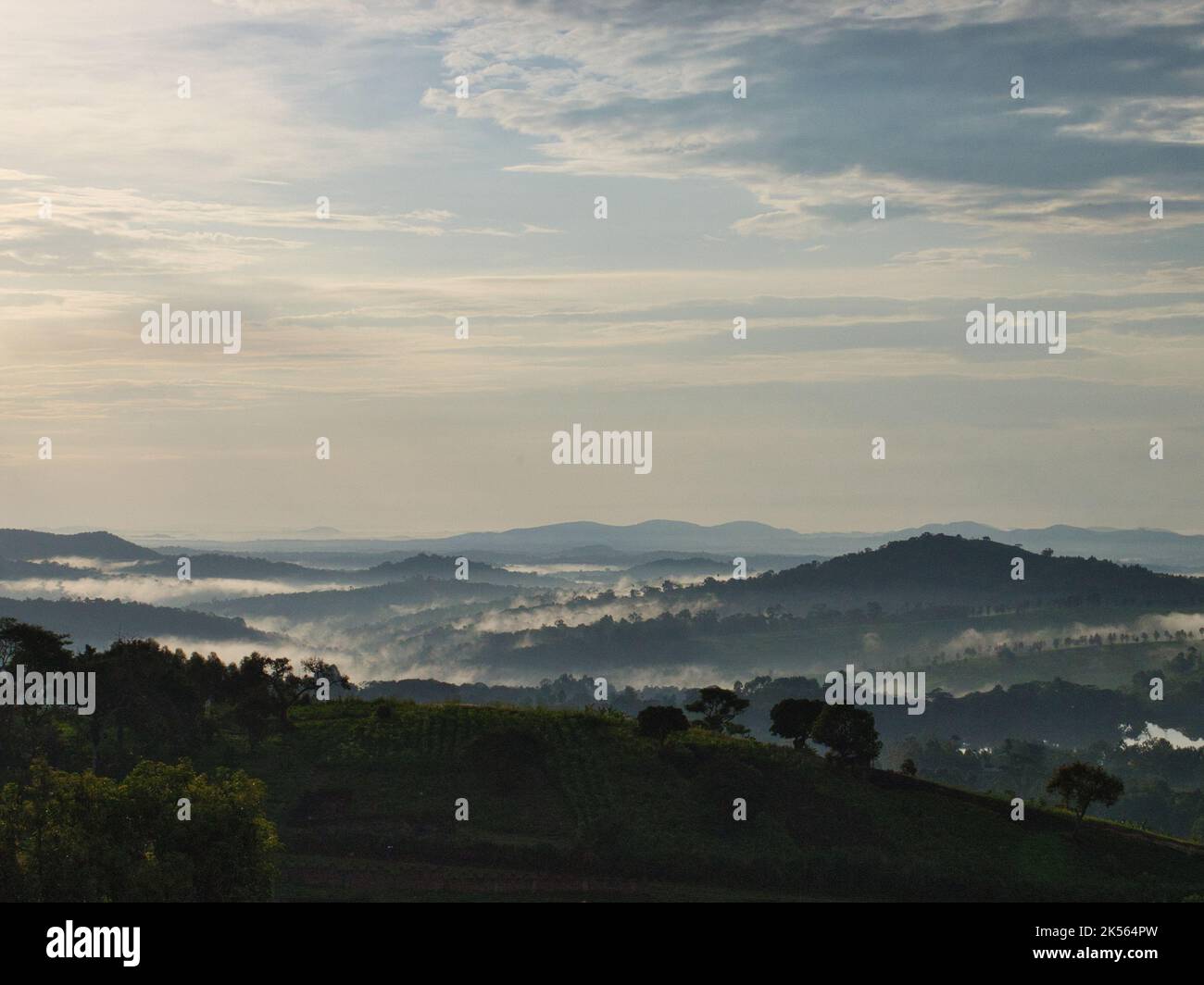 A beautiful shot of morning mist over crater highlands in Uganda Stock ...