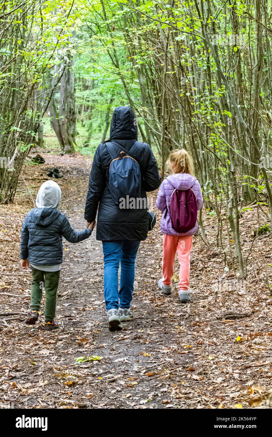 Two kids walking on hi-res stock photography and images - Alamy