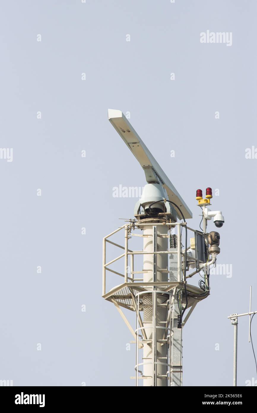 Spinning rotating radar equipment on top of a ship - in front of the ...