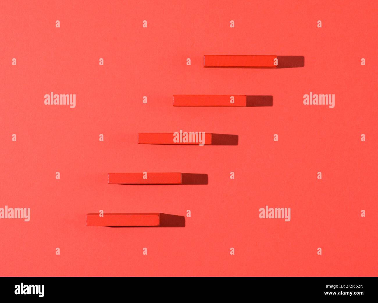 Steps to success. Red steps on red background Stock Photo - Alamy