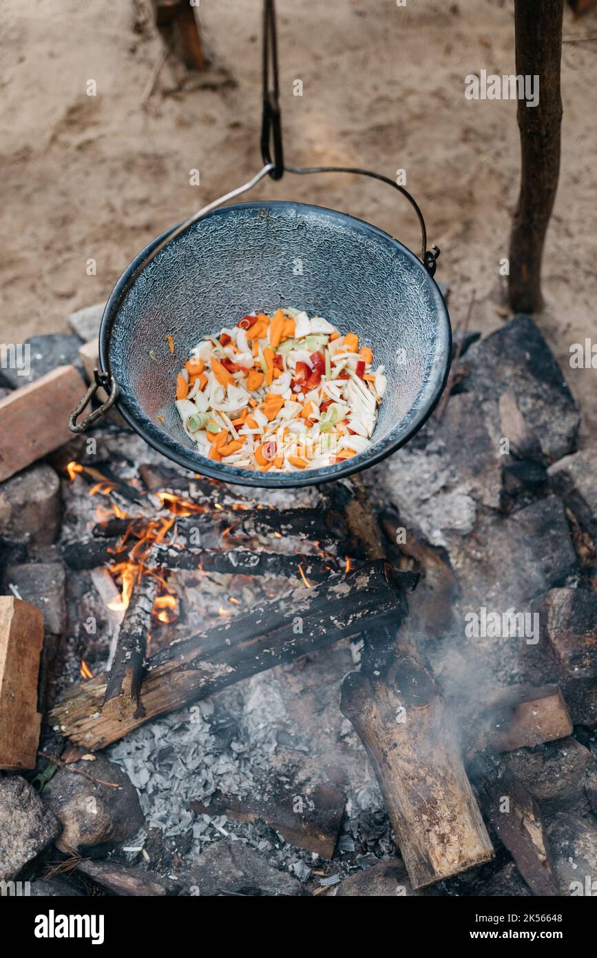Food cooking in cauldron over fireplace hi-res stock photography and ...