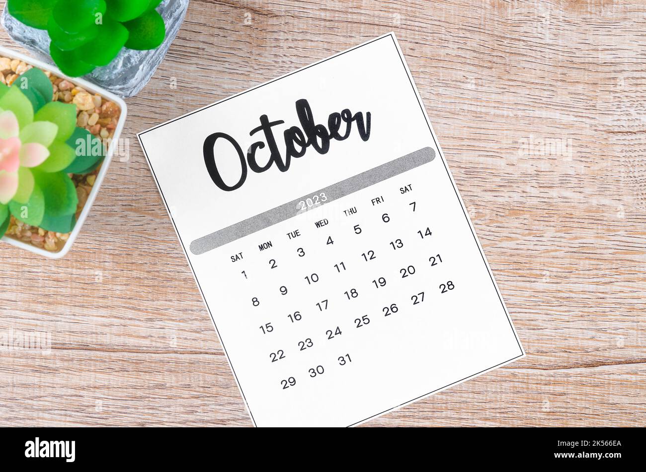 October 2023 Monthly calendar for 2023 year on wooden background Stock ...