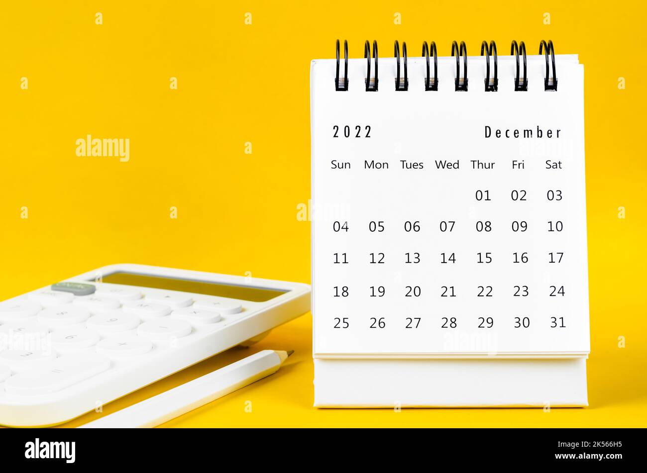 December 2022 Monthly desk calendar for 2022 year and calculator with ...