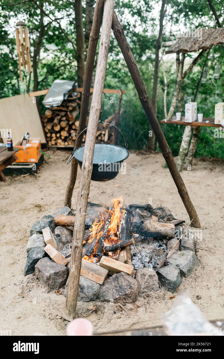 Food cooking in cauldron over fireplace hi-res stock photography and ...