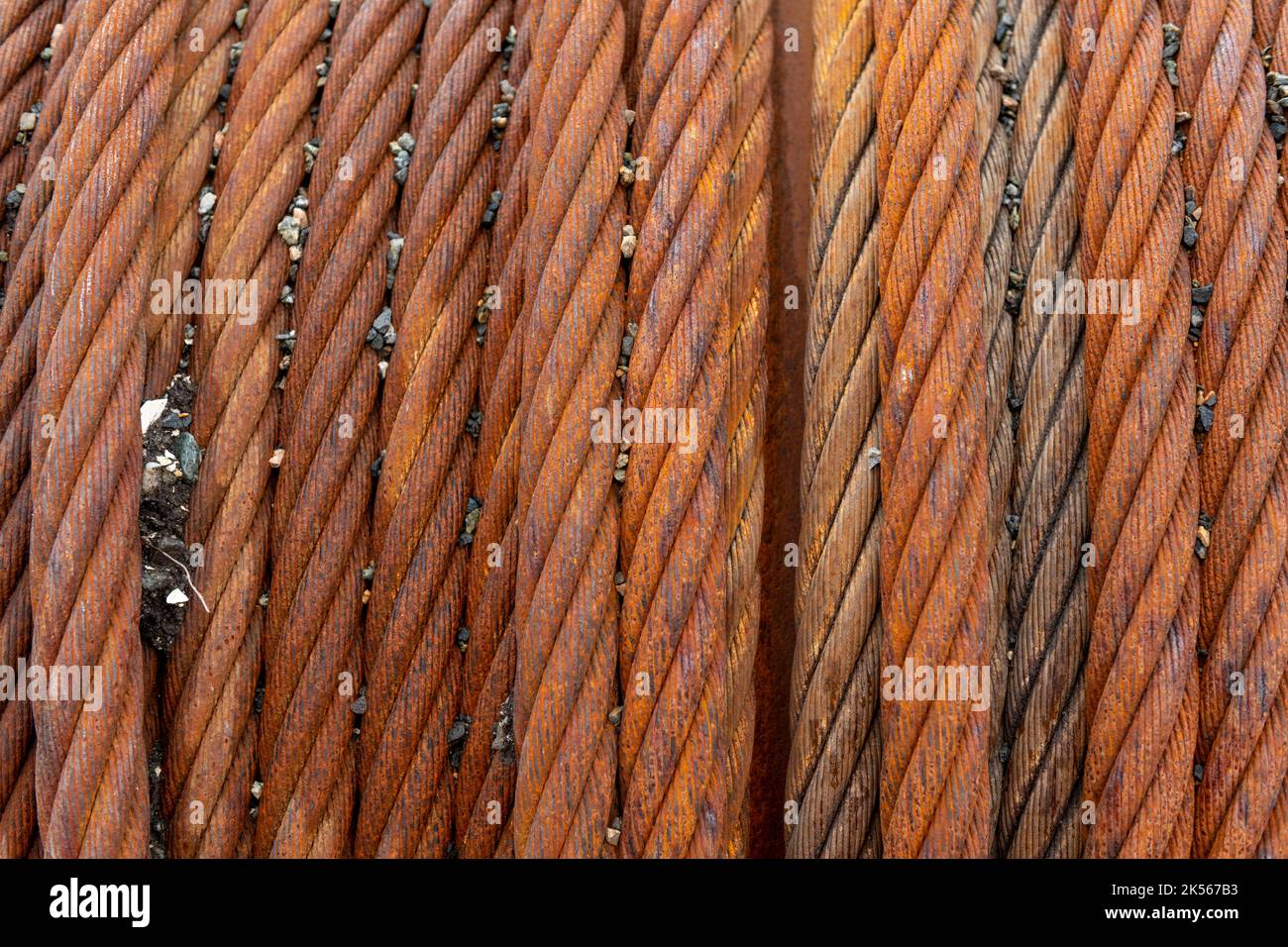 Close up of rusty steel cable coiled on a drum Stock Photo - Alamy