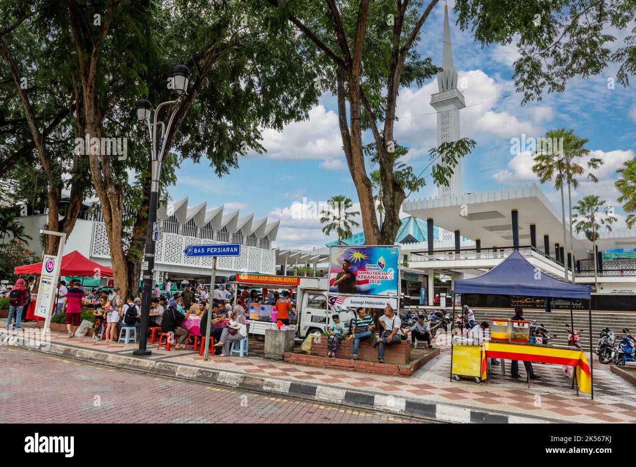Kuala Lumpur, Malaysia. People Gathering at Food Vendors after Mid-day ...