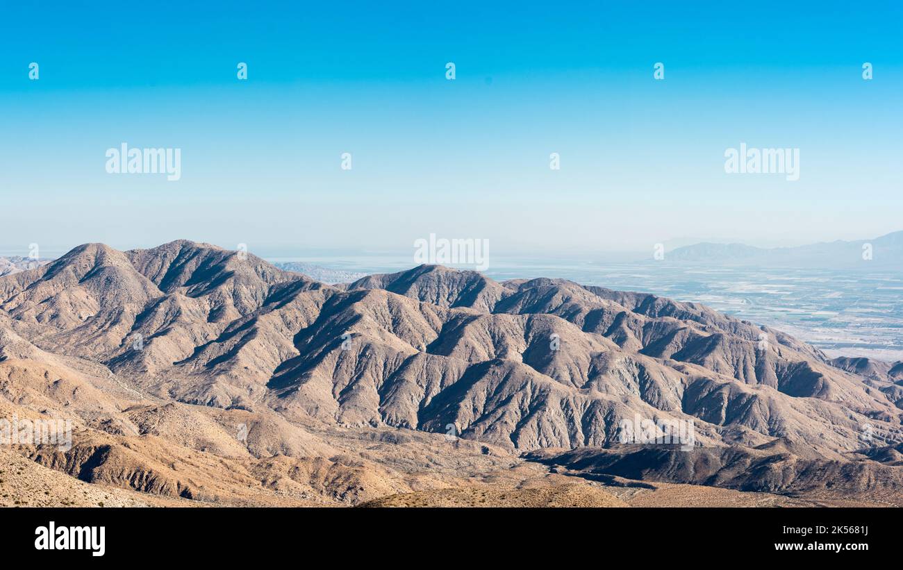 An aerial view of the rocky deserted hills on a bright sunny day Stock ...