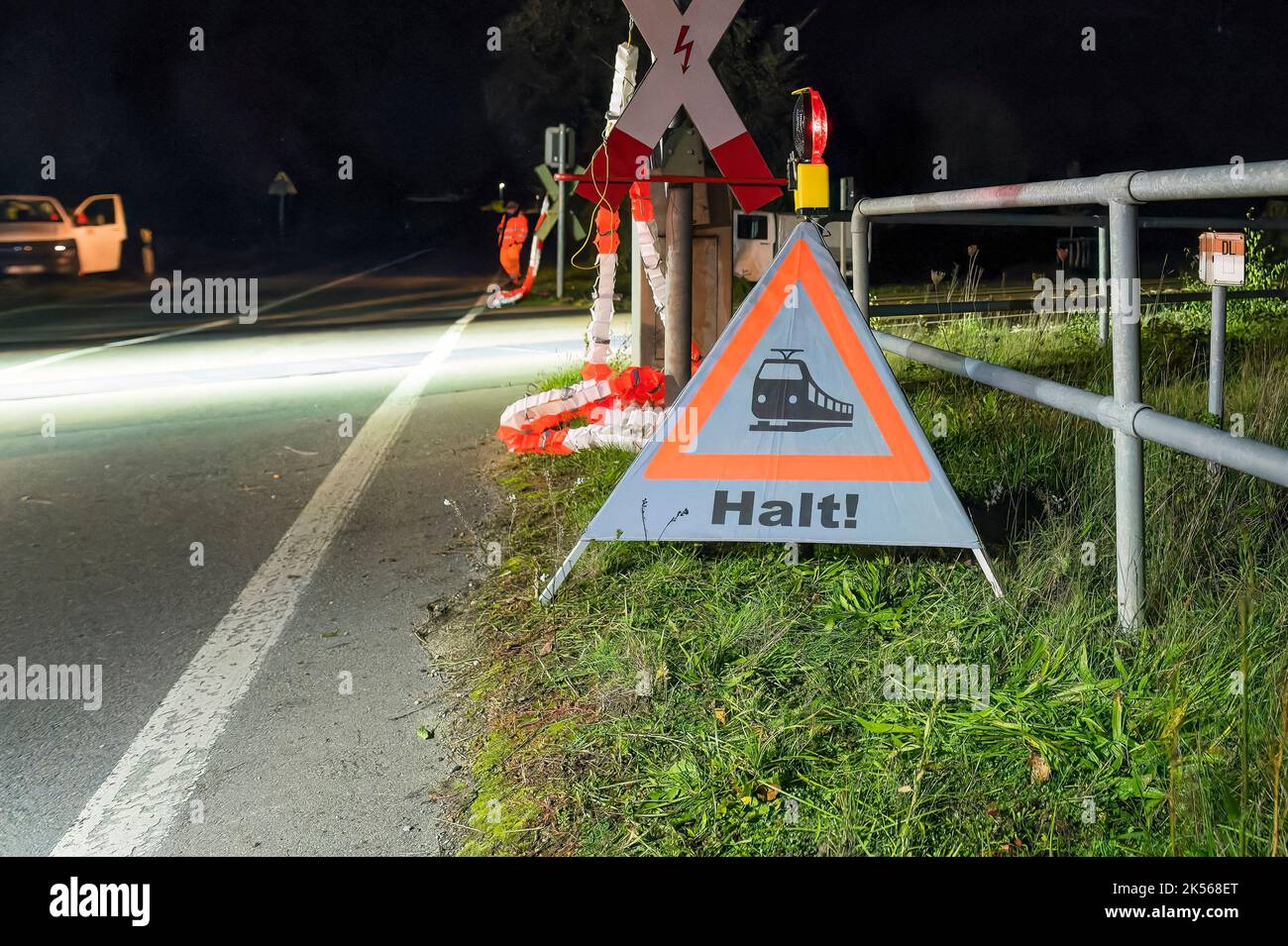 Warning triangle with German inscription Stop at a level crossing Stock ...