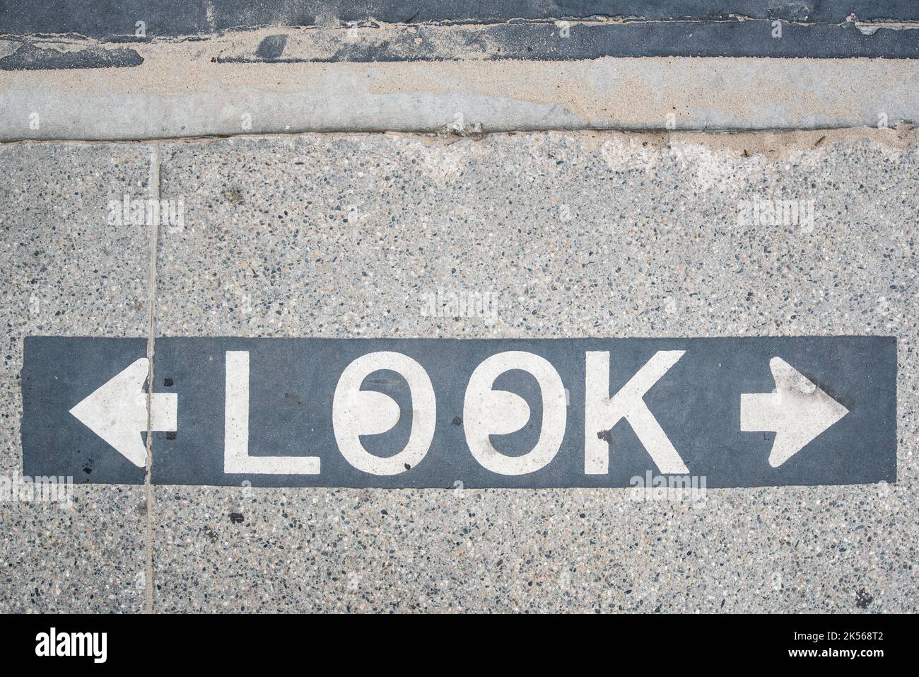 A Look marked sign on the ground at the crosswalk Stock Photo - Alamy