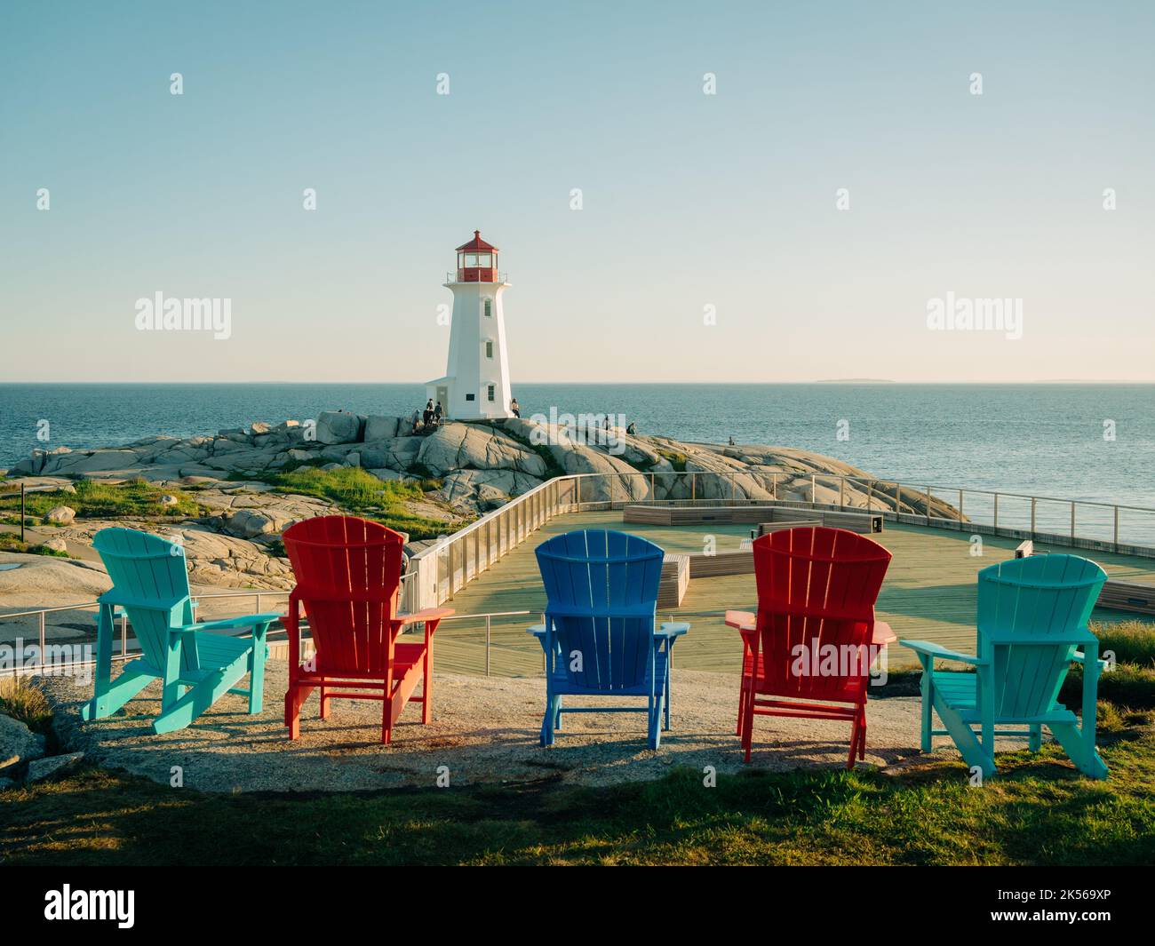 Colorful Adirondack chairs and Peggys Cove Lighthouse, Peggys Cove ...