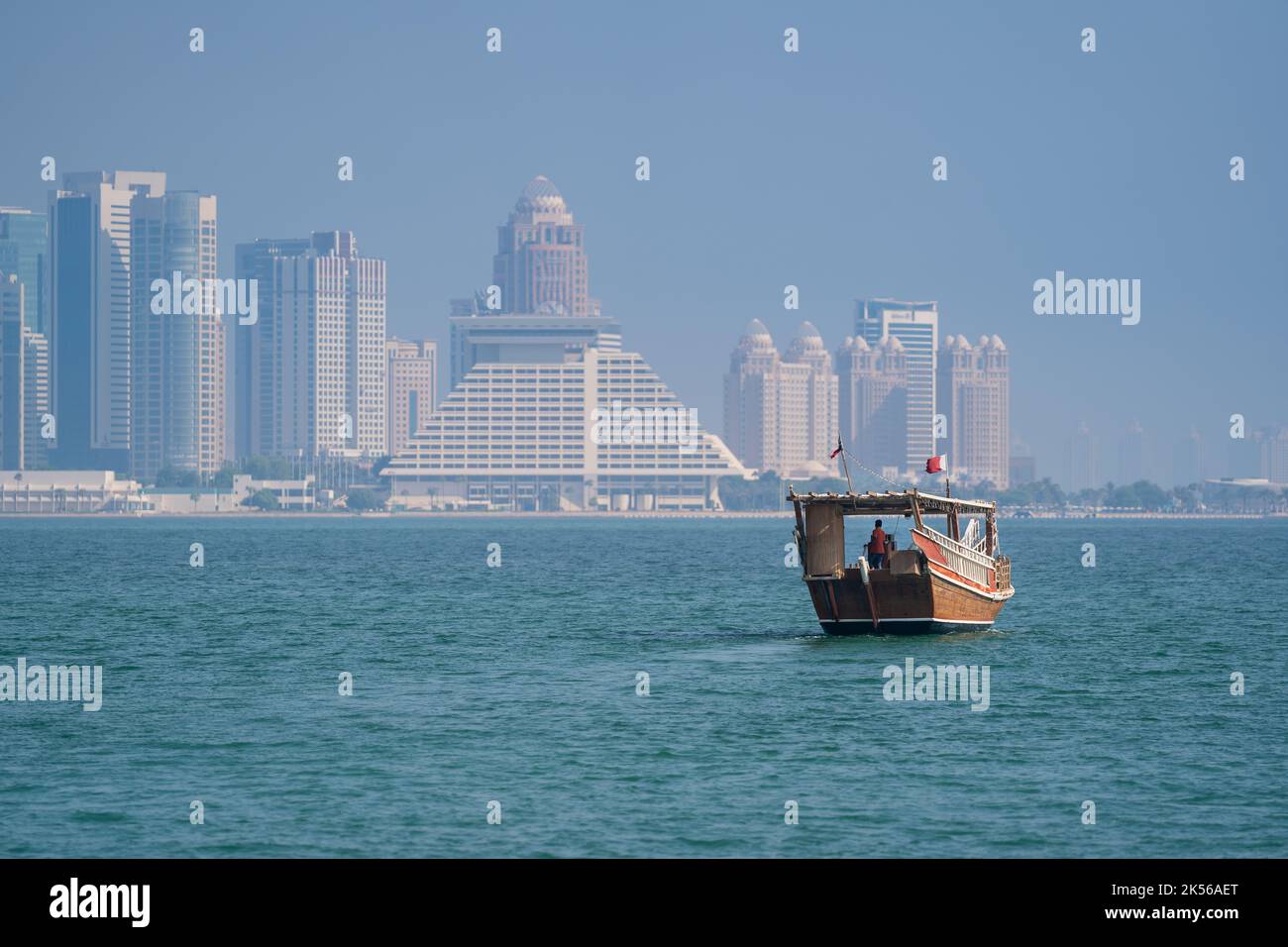 Traditional dhow and seafront of Doha West Bay skyline on background ...