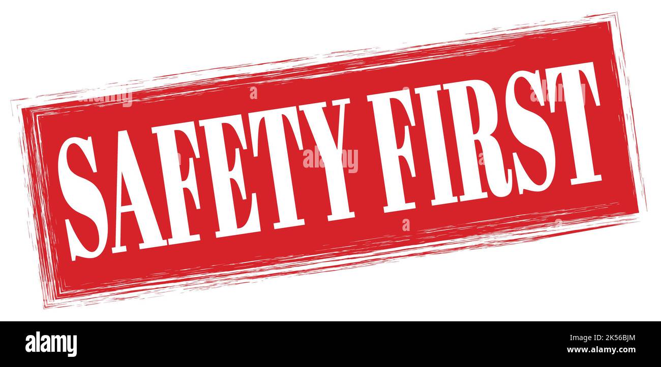 SAFETY FIRST text written on red rectangle stamp sign Stock Photo - Alamy