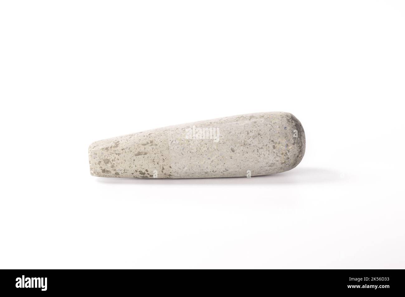 polished pestle is often used with a mortar. isolated on a white ...
