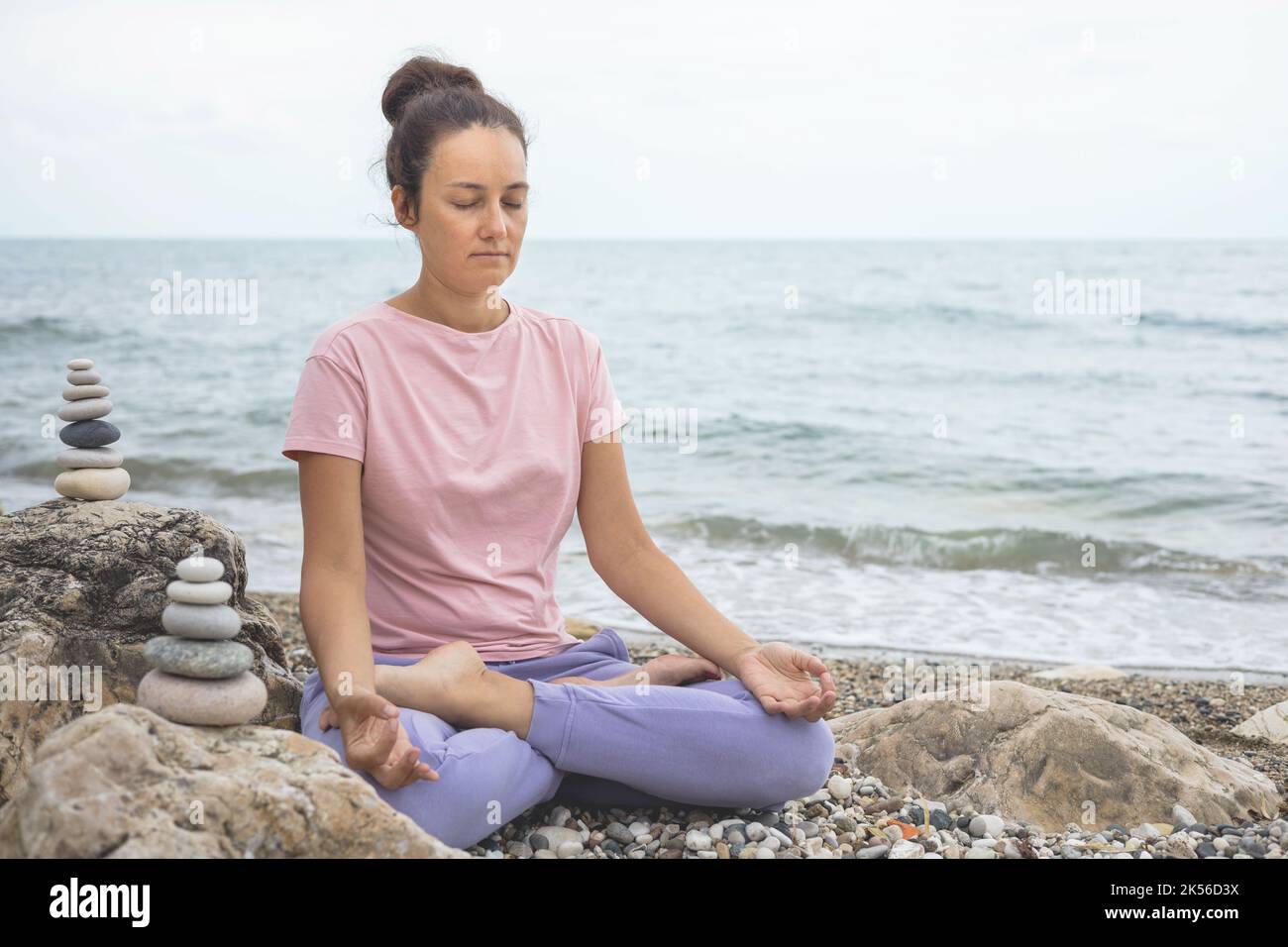 Relaxed yoga woman in lotus posture mudra harmony balance meditation at ...