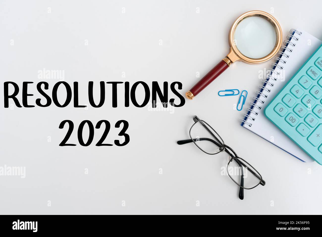 Text caption presenting Resolutions 2023, Word Written on list of ...
