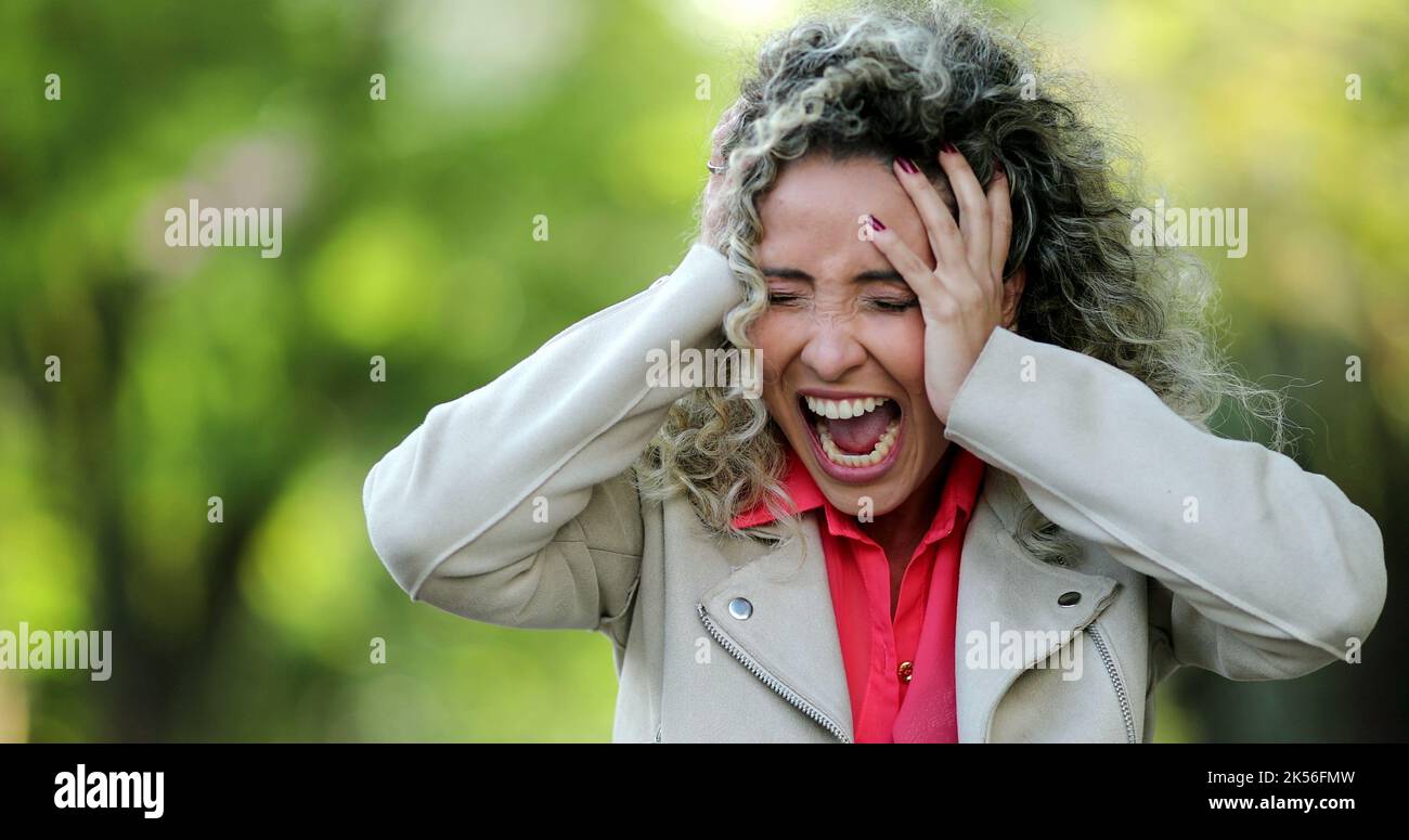 Anxious person screaming in despair. Nervous woman in anger yelling ...
