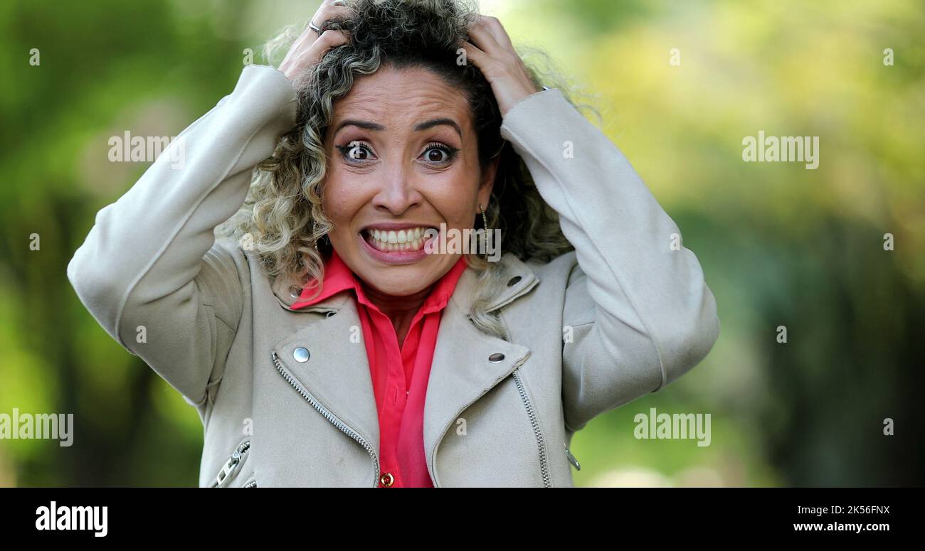 Anxious person screaming in despair. Nervous woman in anger yelling ...