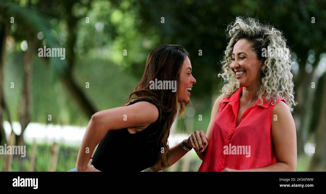 Candid women laughing together, person real life laugh and smile ...