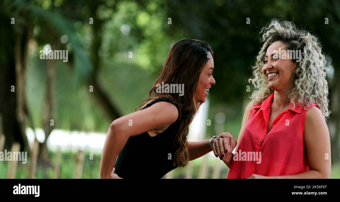 Candid women laughing together, person real life laugh and smile ...