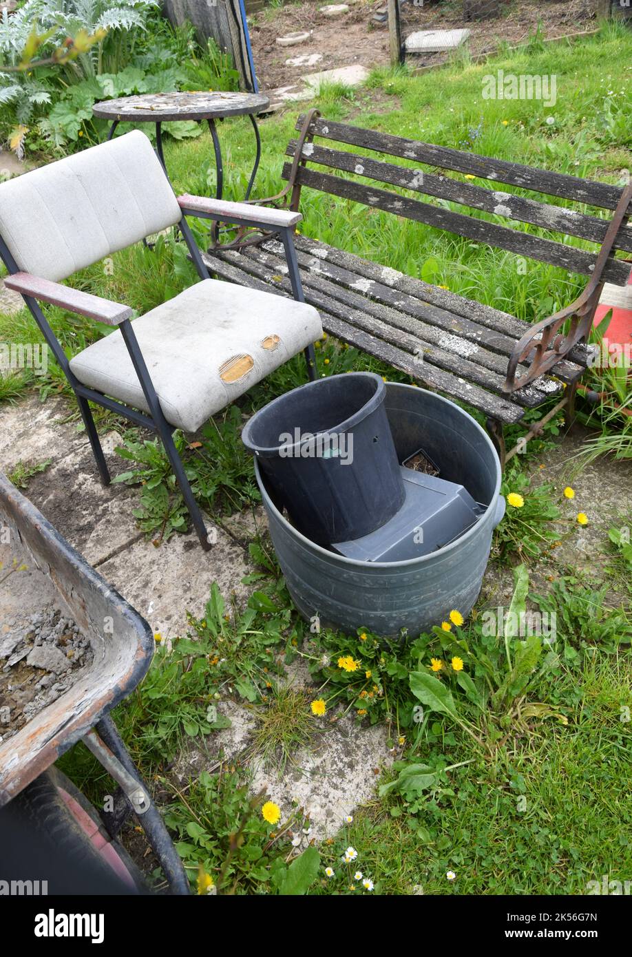 worn out items at allotment Stock Photo - Alamy