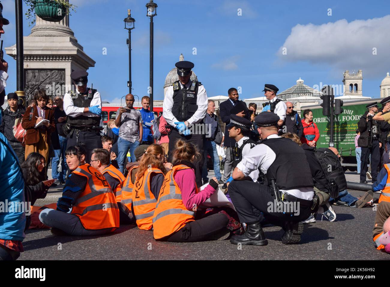 London, UK. 6th October 2022. Just Stop Oil protesters block Trafalgar ...