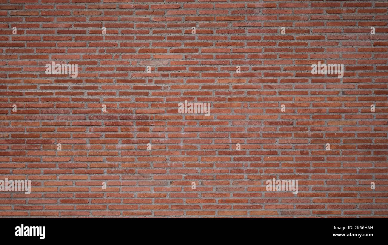Texture of the wall of thin long red bricks Stock Photo - Alamy