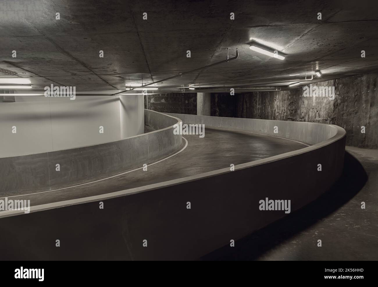 Way down to underground car parking. Perspective view of Curving shaped ...