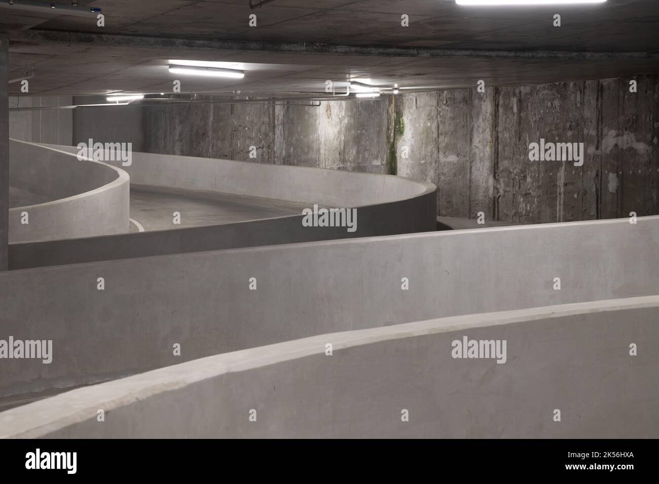 Perspective view of Curving shaped ramp of the basement made of ...