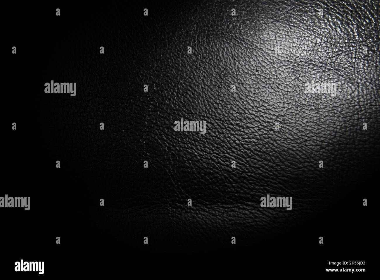 Black leather texture. Abstract background of dark leather with small ...