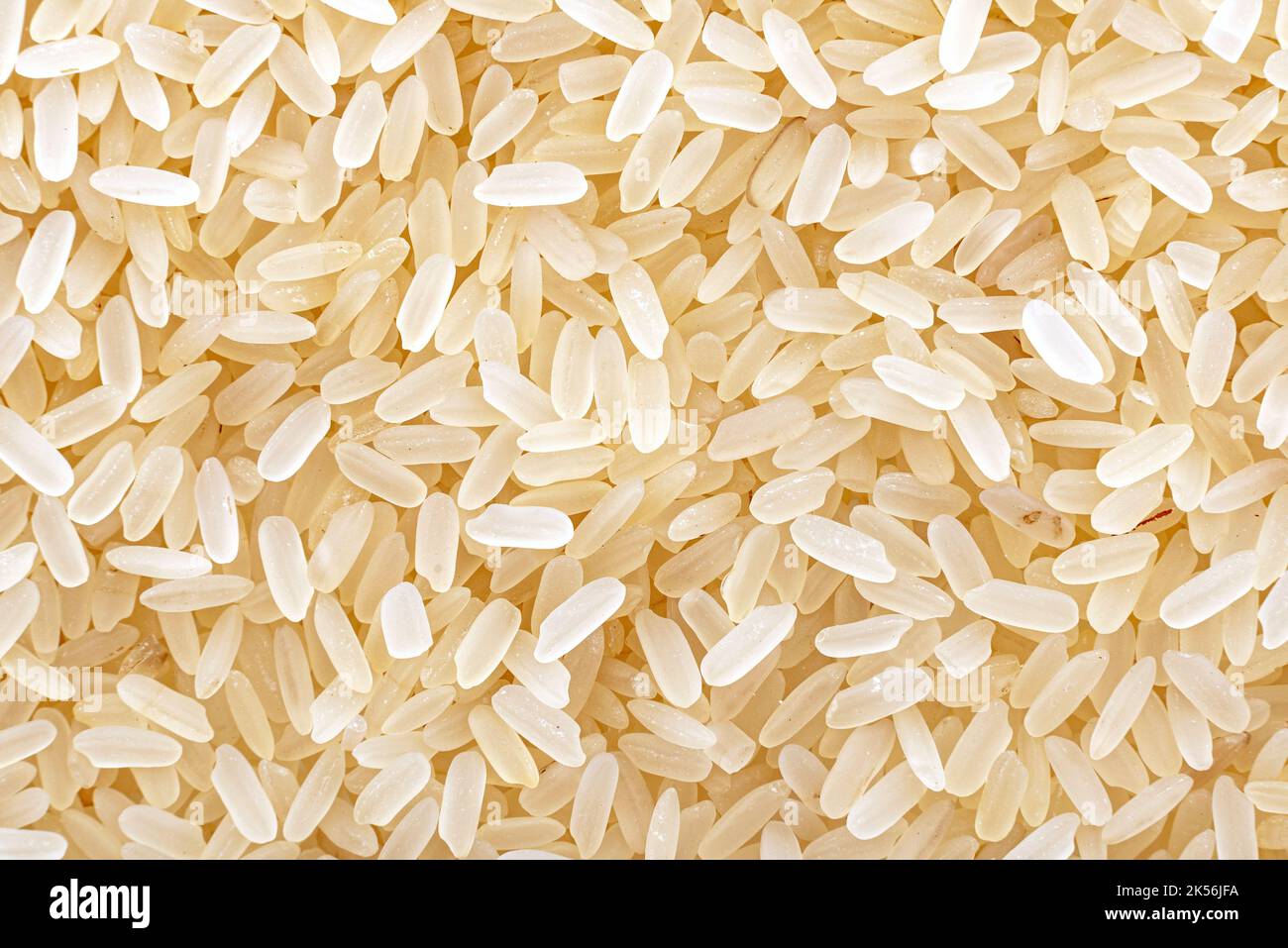Rice background. Rice dry grains close up Stock Photo - Alamy