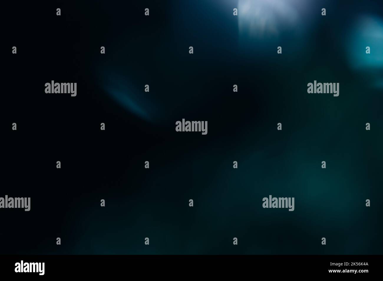 bokeh lens flare blur glow overlay blue light dark Stock Photo - Alamy