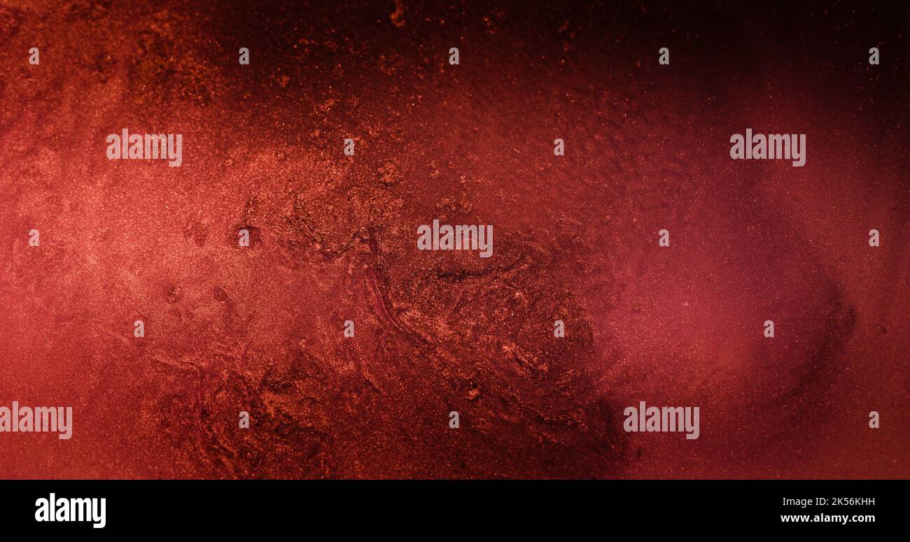 glitter texture particles background luscious red Stock Photo - Alamy