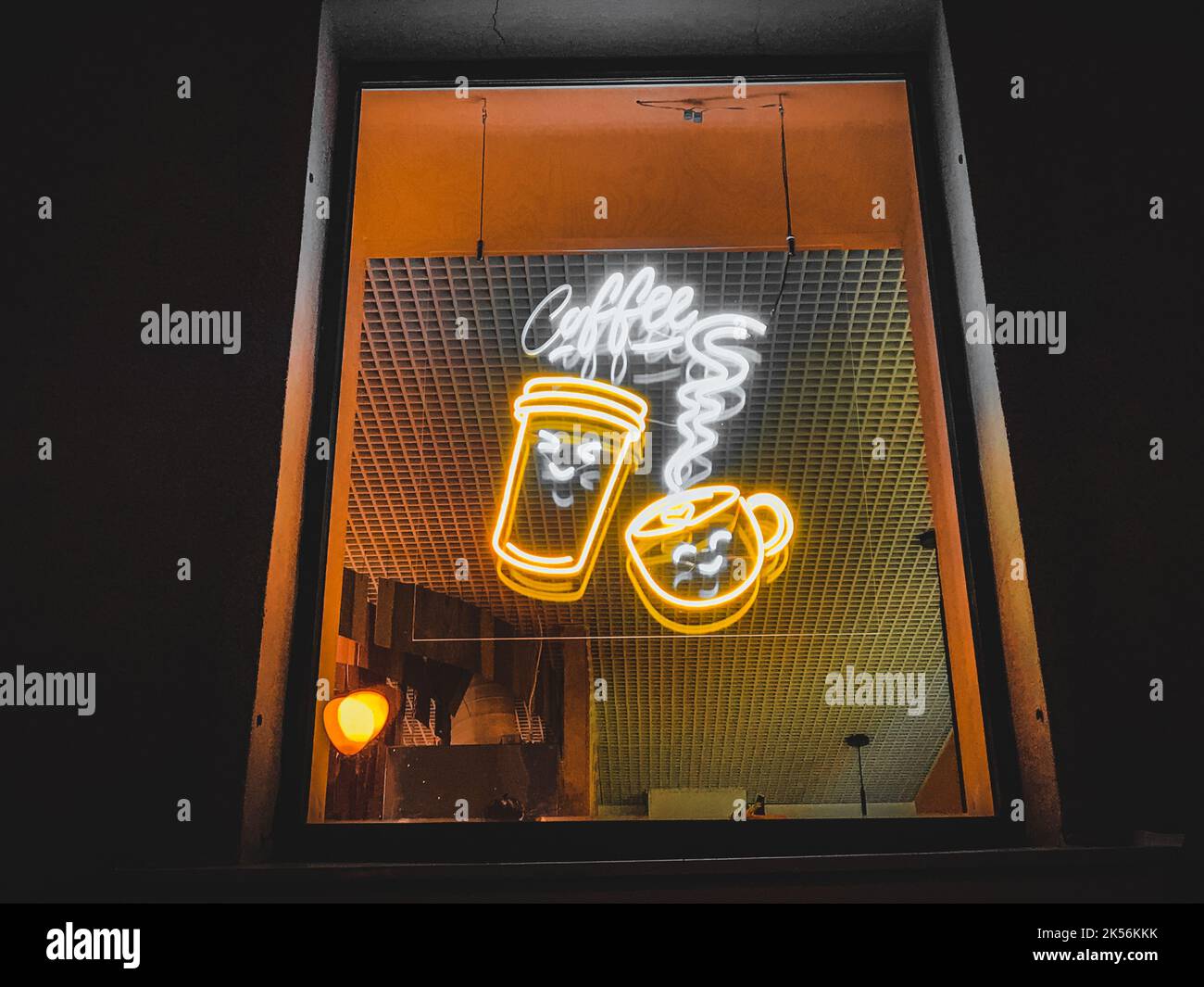neon coffee cup sign cafe window night life cute warm Stock Photo - Alamy