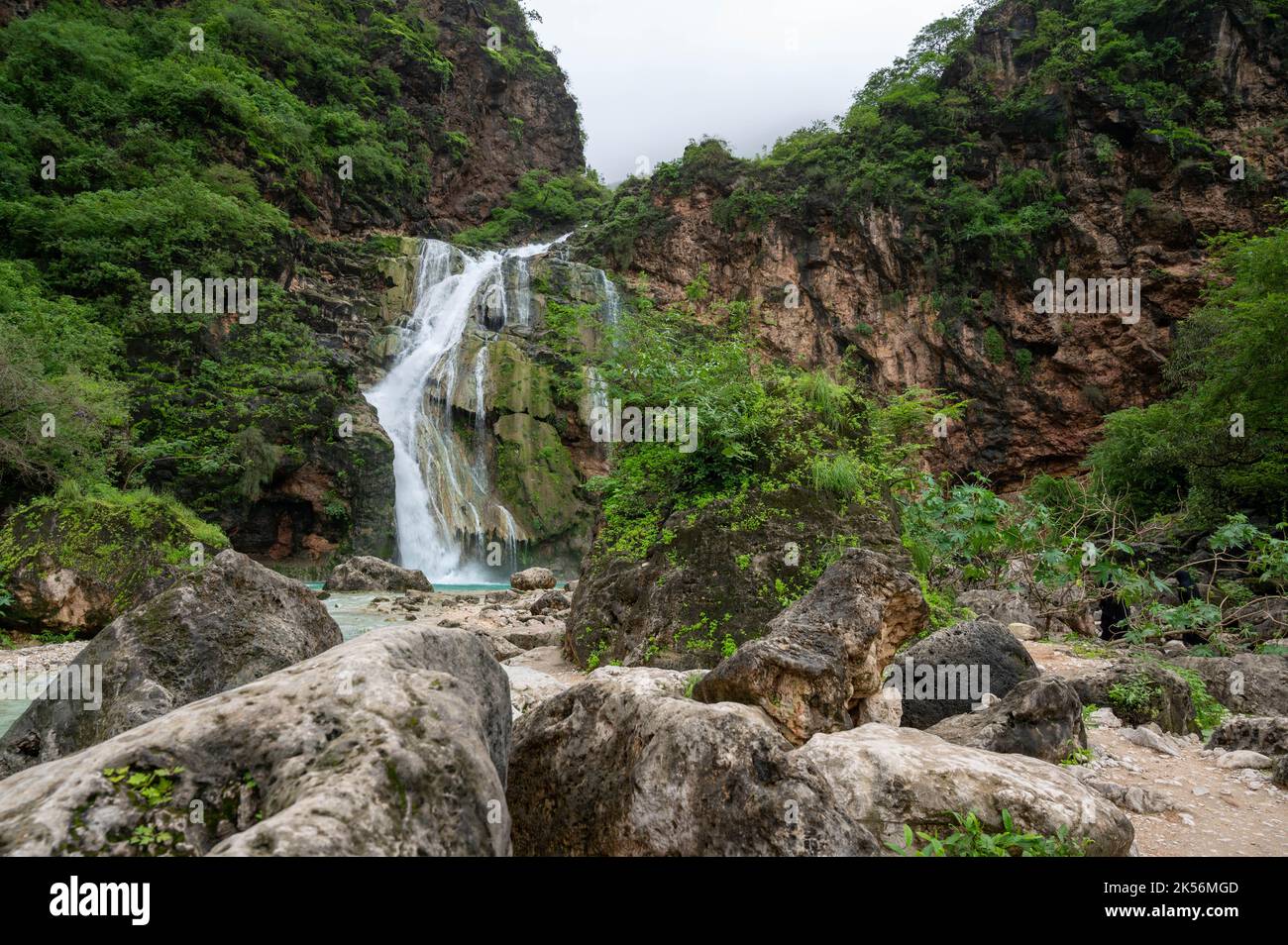 Ayn Khor during the autumn rainy season or khareef. Waterfall and ...