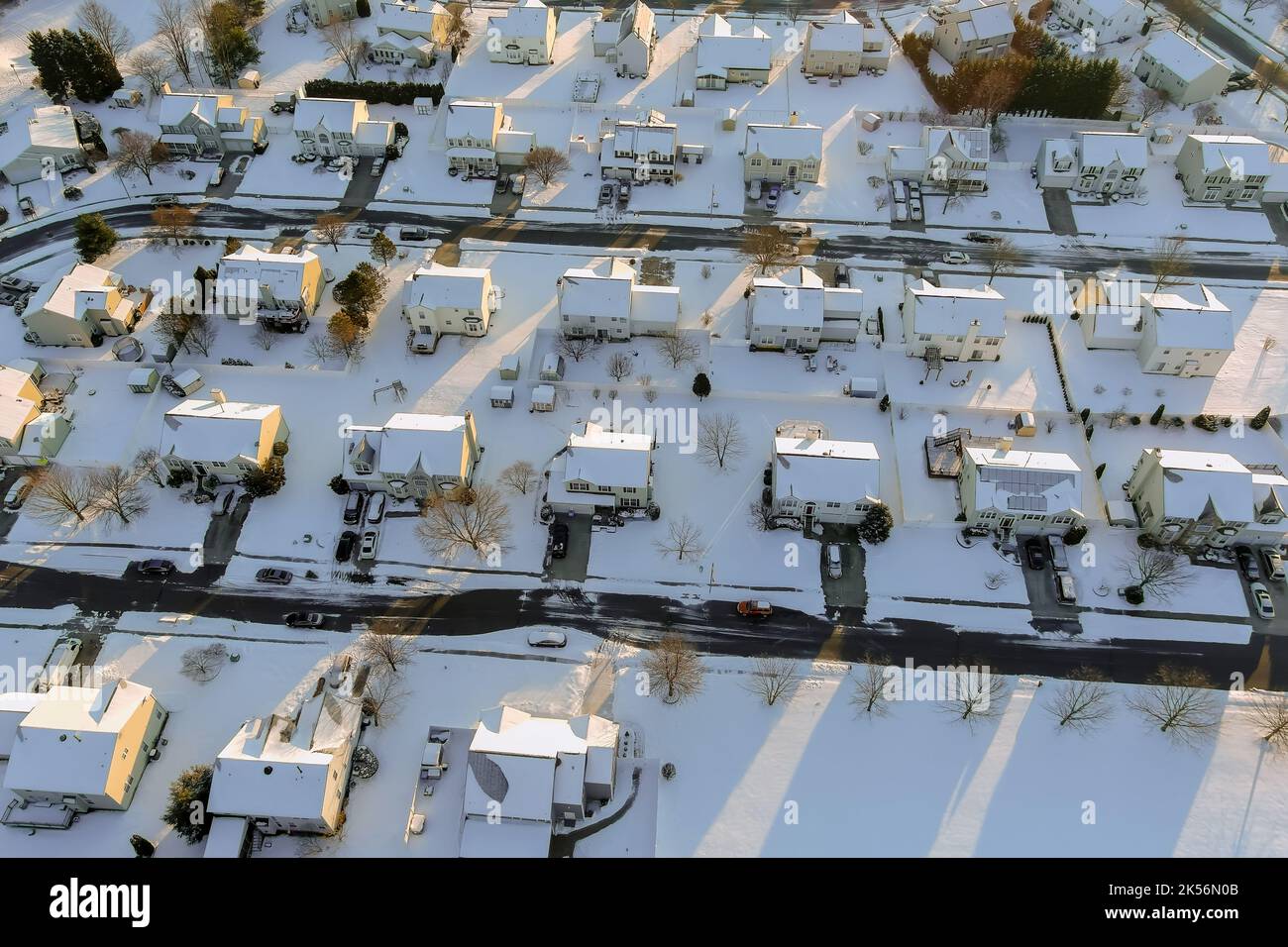 There are properties in a small town in New Jersey with snow covered ...
