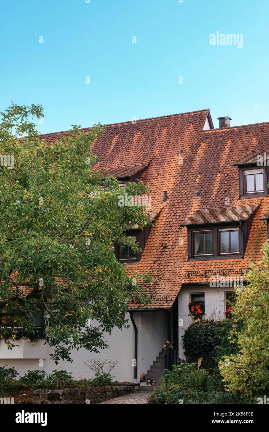 Traditional small house with beautiful outdoor decor facade in Germany ...