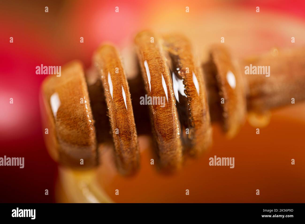 spindle spoon with honey close-up, selective focus, honey spoon Stock ...