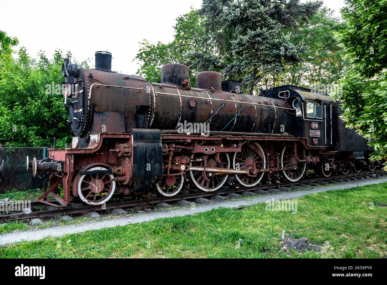 The old steam locomotive is parked in a depot in Craiova, Romania Stock ...