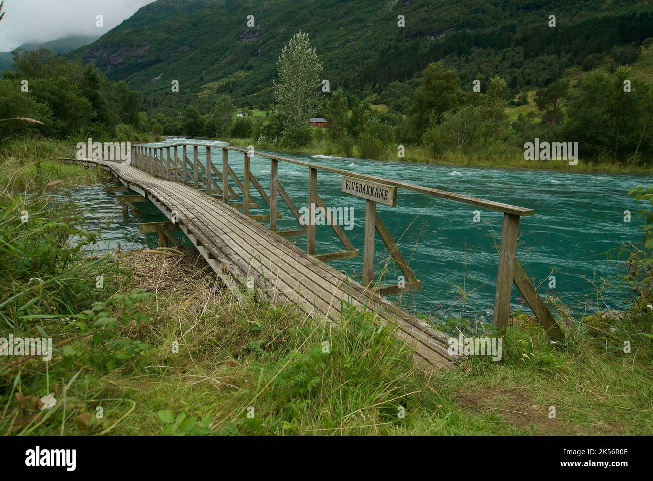 Wooden footbridge and fishing platform across a tributary of the ...