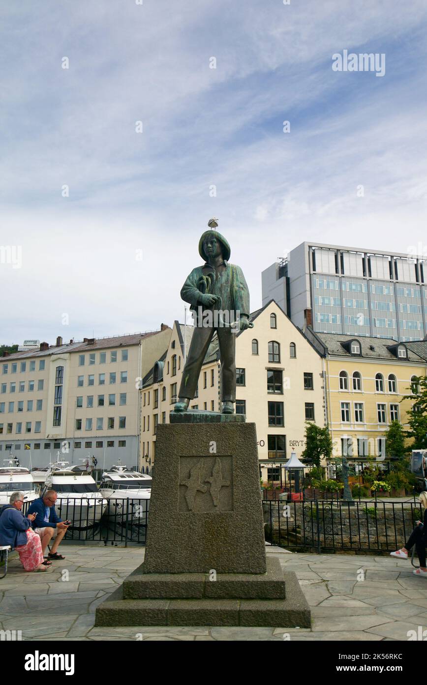 Ålesund: Skarungen fisher boy statue in Alesund, Norway. A monument ...