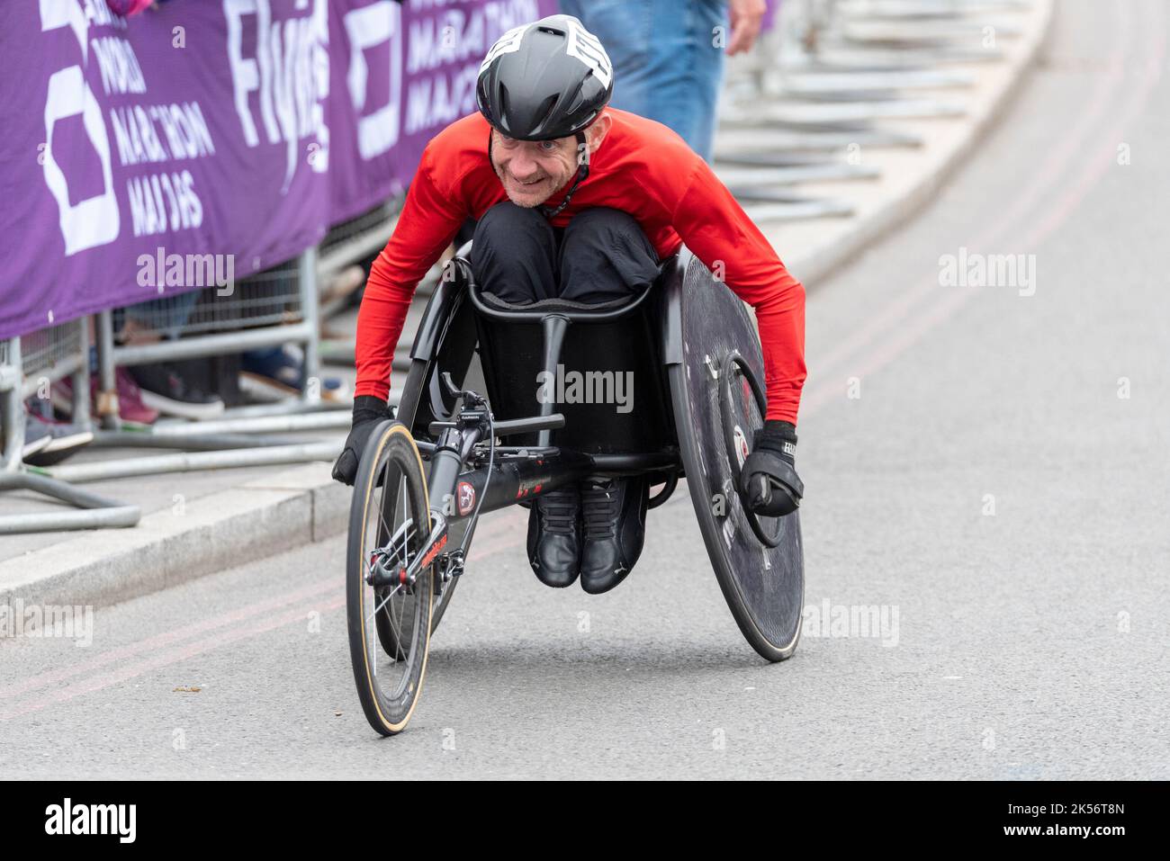 John McCarthy wheelchair athlete racing in the TCS 2022 London Marathon ...