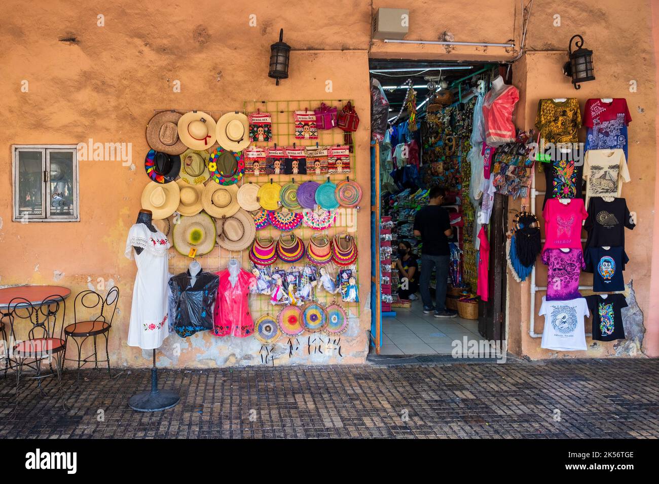 Souvenirs and traditional clothes for sale at a small shop in Merida ...