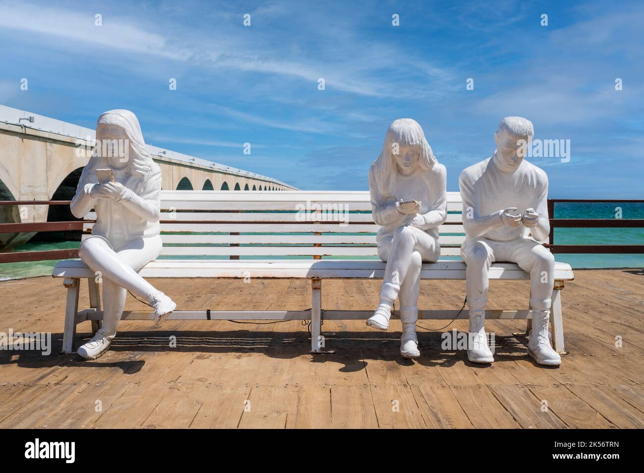 Statue next to the pier at Progreso, a popular beach town near Merida ...