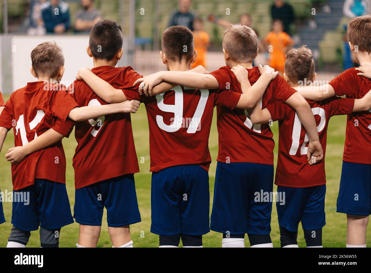 Children united in sports soccer team during football penalty kick ...