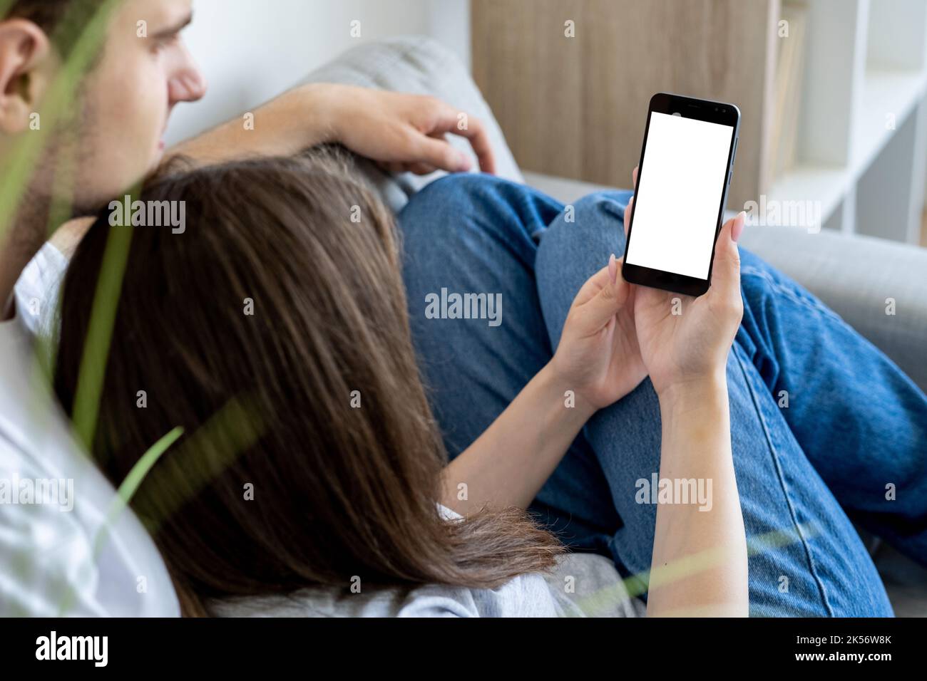 mobile mockup relaxed couple online communication Stock Photo - Alamy