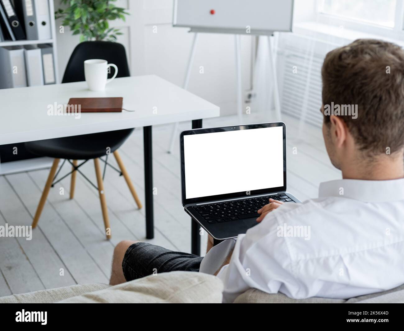 virtual connection relaxed man computer mockup Stock Photo - Alamy
