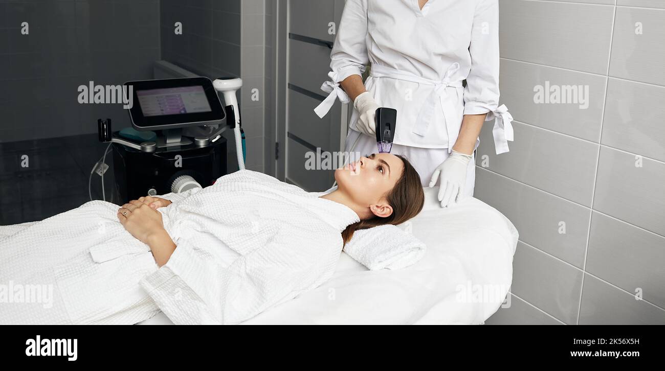 Non-surgical lifting of woman face with help of newest microneedle ...